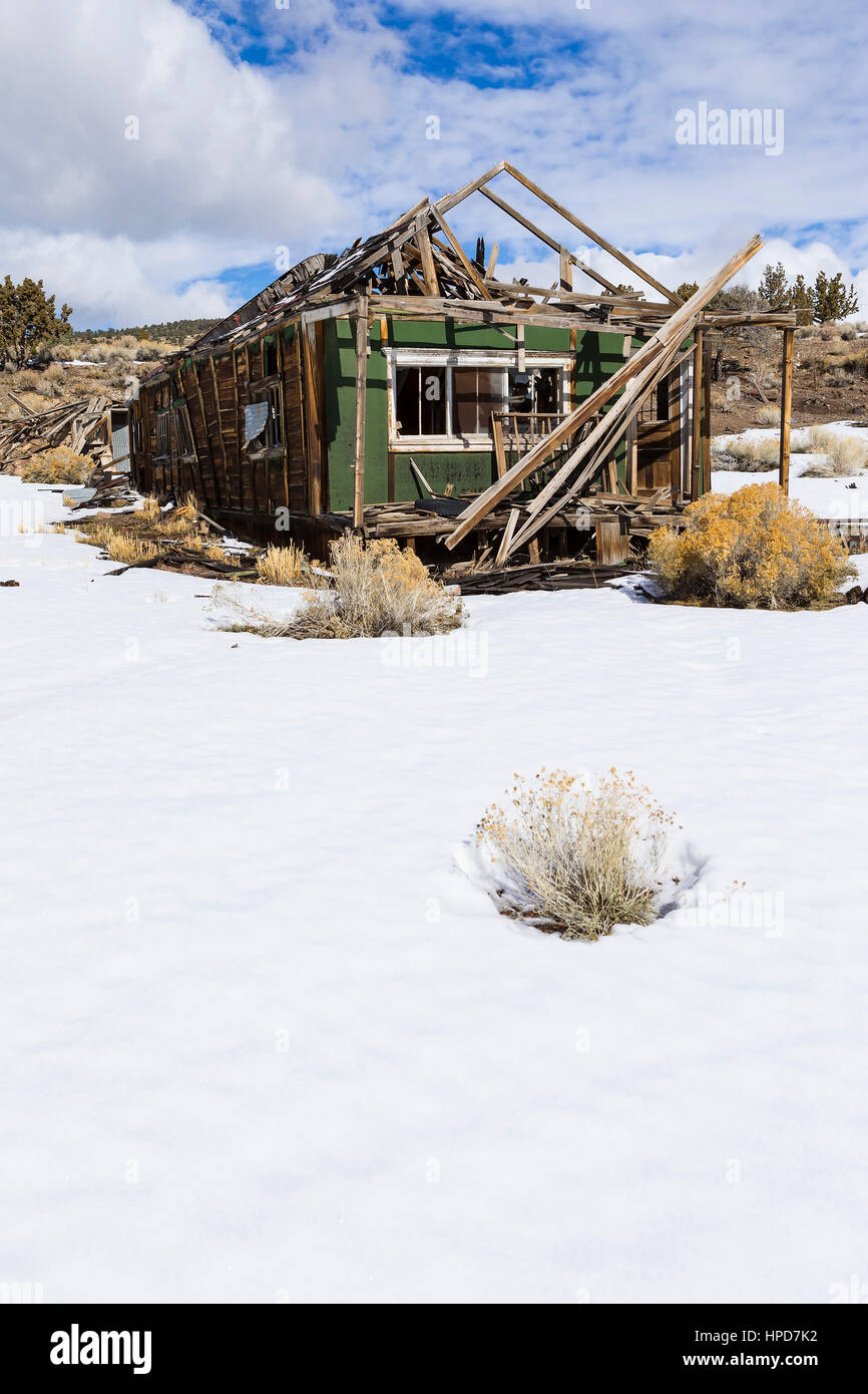 Old weathered Ghost Town buildings in the desert during winter with ...