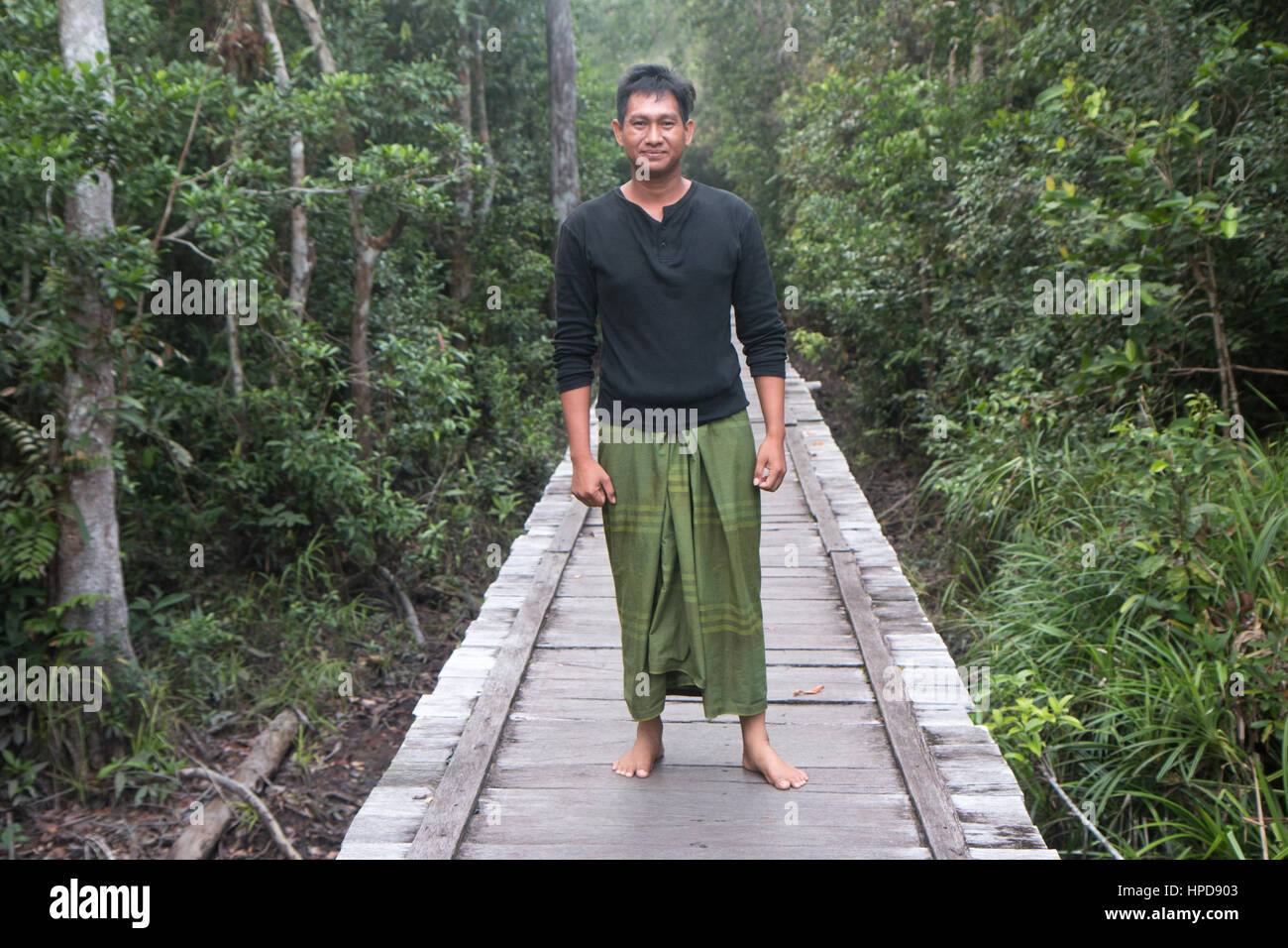 Portrait of a young local man in Indonesia Stock Photo - Alamy