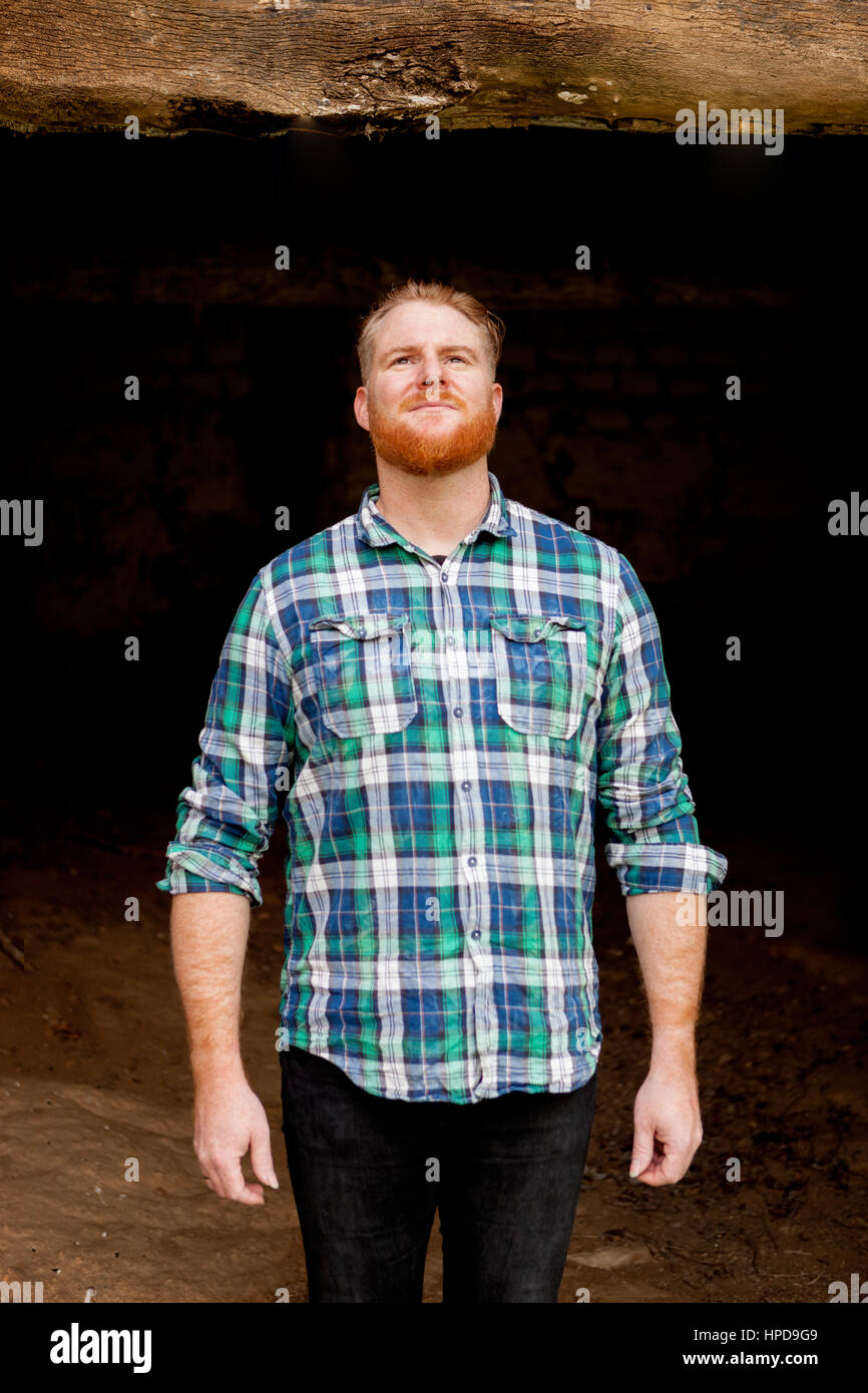Portrait of red haired man with plaid shirt and long beard Stock Photo ...