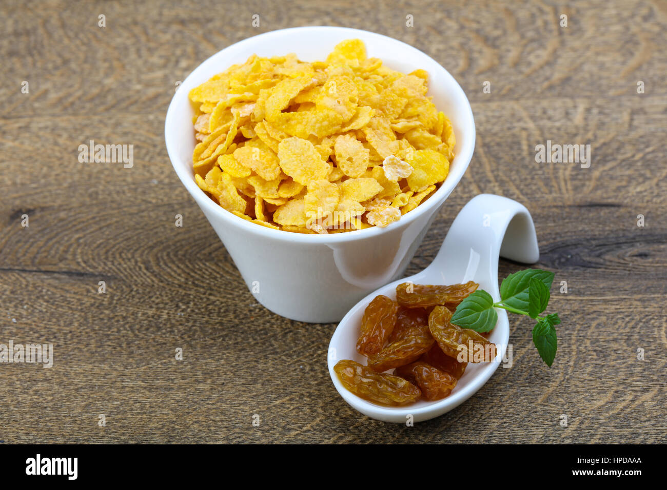 Corn flakes with raisin - dietary fitness breakfast Stock Photo - Alamy