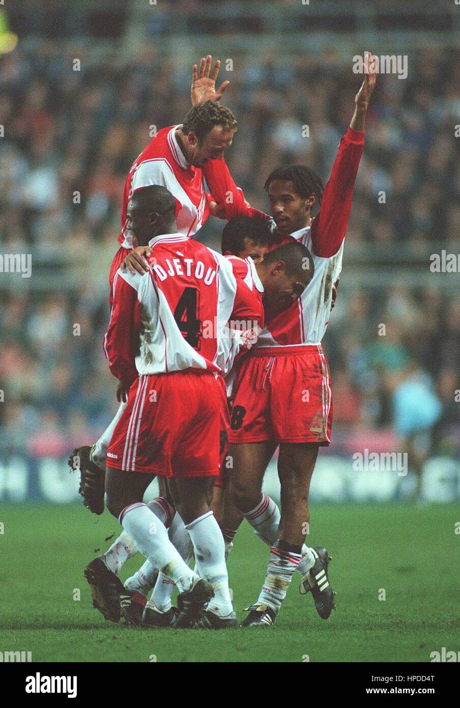 MONACO PLAYERS CELEBRATE NEWCASTLE V MONACO 01 March 1997 Stock Photo ...