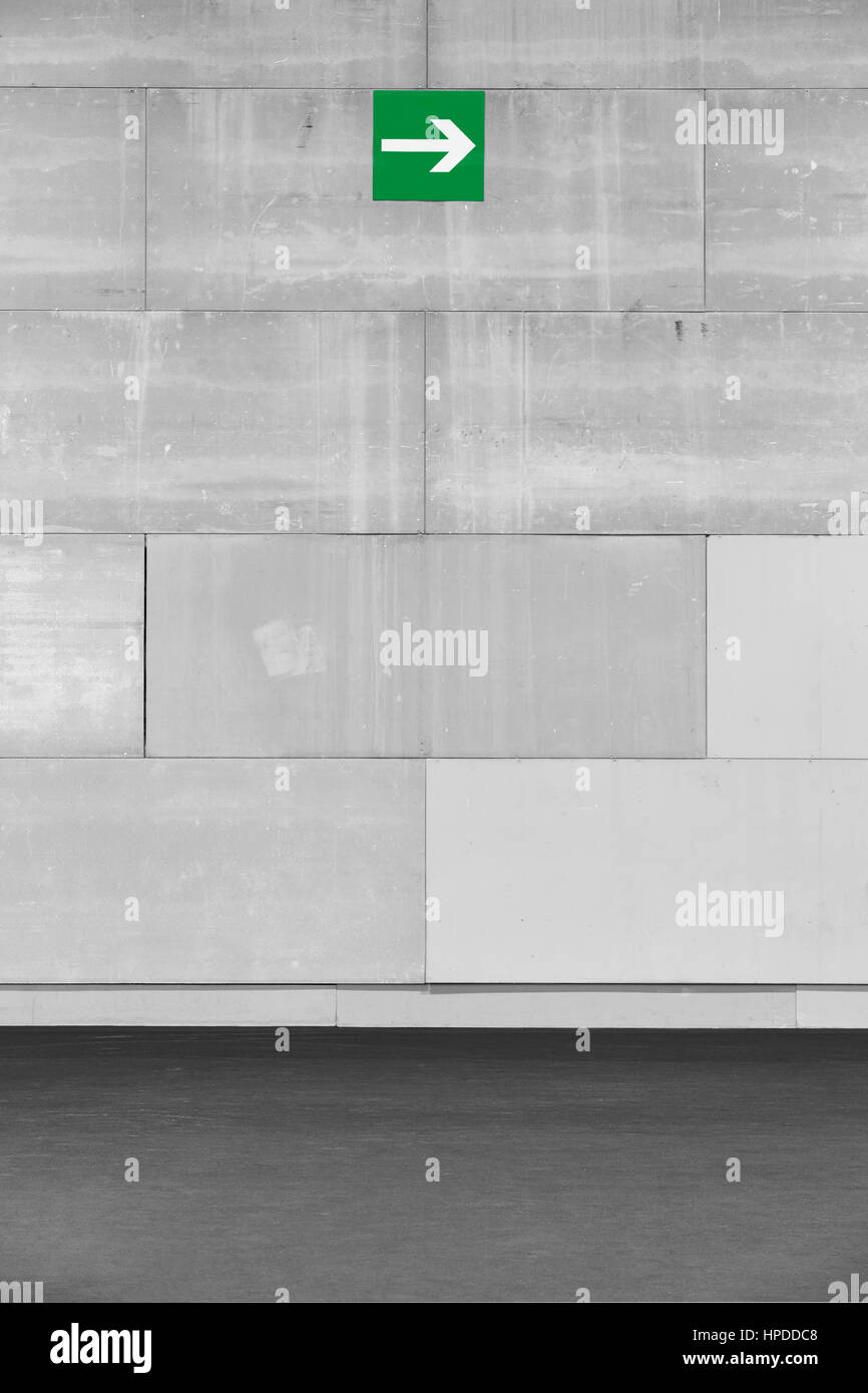 Stone wall with way out signal. Indoor architecture. Vertical Stock ...