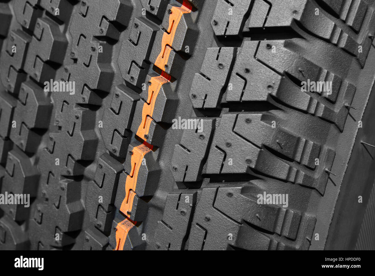 Brand new all terrain tyre macro detail. Vehicle wheel. Horizontal ...