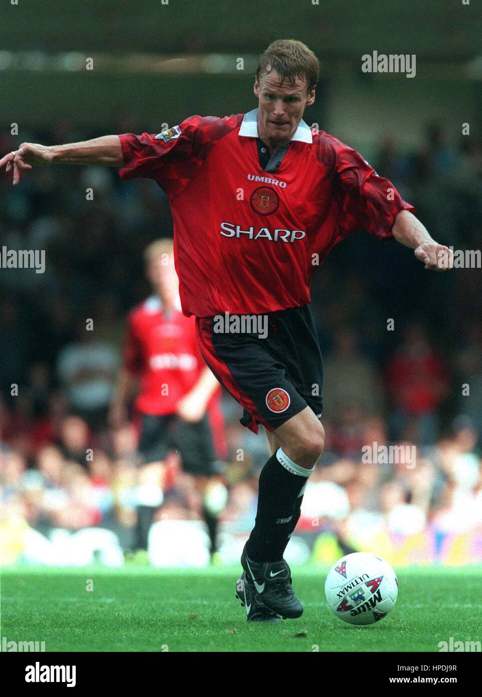 TEDDY SHERINGHAM MANCHESTER UNITED FC 23 August 1997 Stock Photo - Alamy