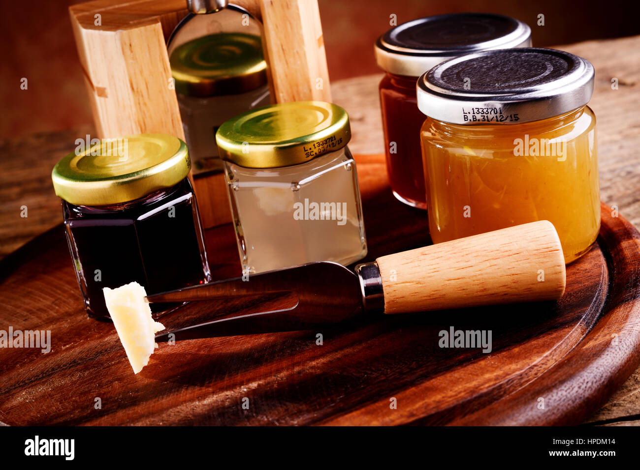 cheese tasting set on wooden board Stock Photo - Alamy