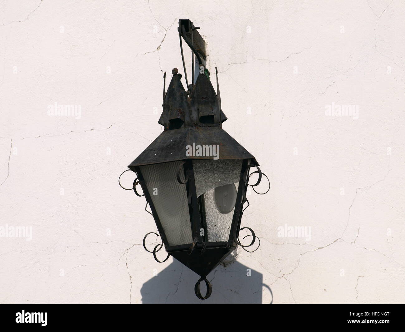 Lamp on building's wall Stock Photo - Alamy