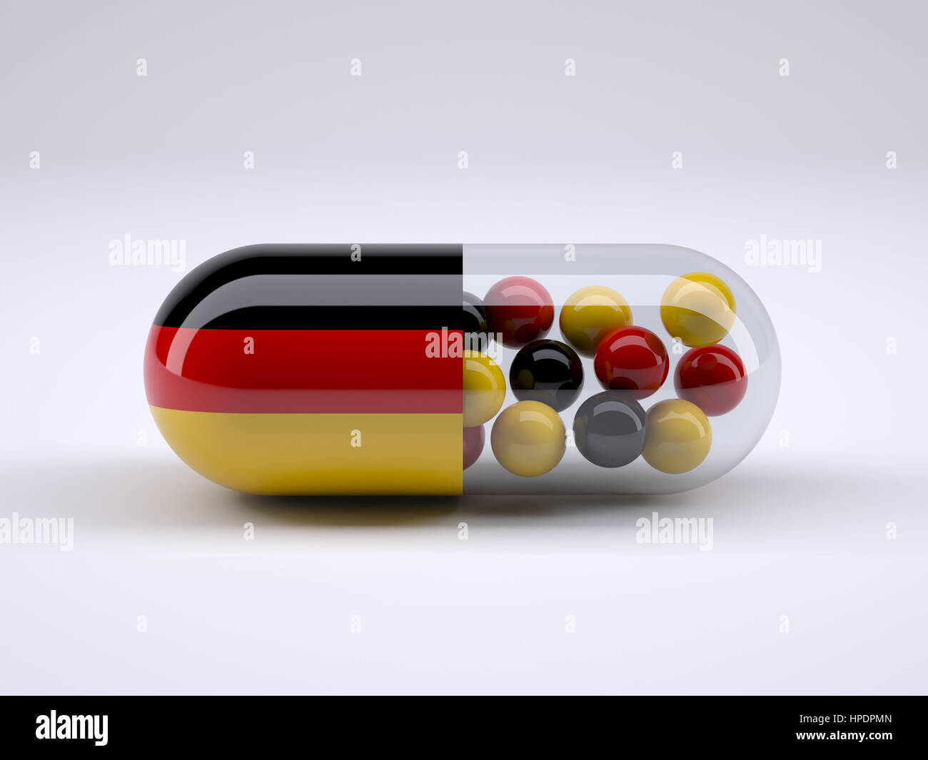 Pill with German flag wrapped around it and red ball inside, 3d ...