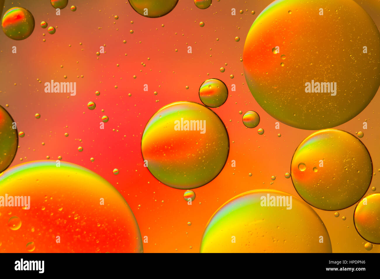 Psychedelic yellow and orange oil and water abstract background Stock ...