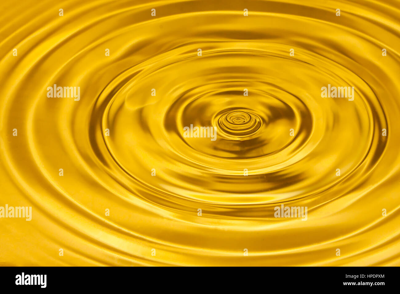 Gold water ripple Stock Photo - Alamy