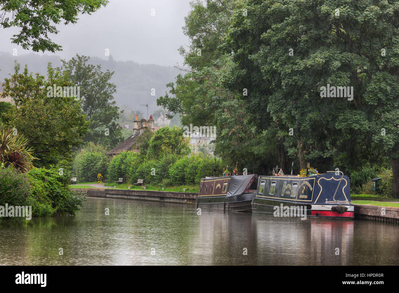 A riverside scene on a drizzling day Stock Photo - Alamy