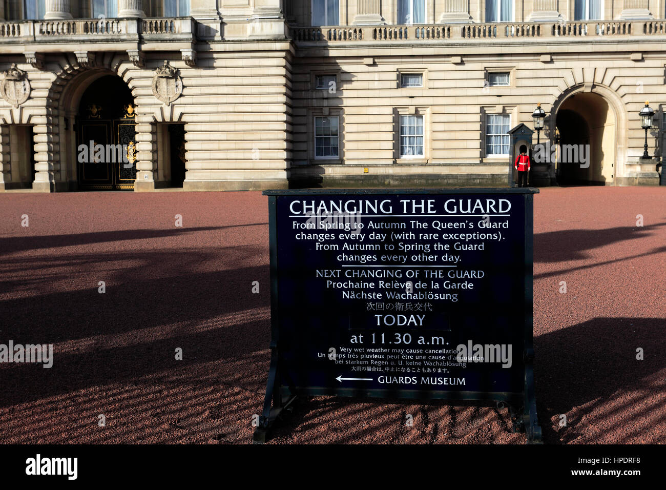 Changing of the guard sign, frontage of Buckingham Palace, St James ...
