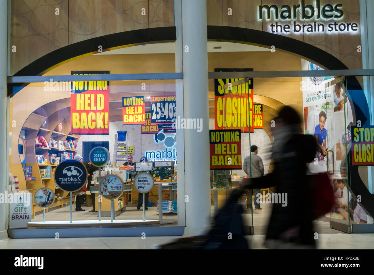Liquidation signs adorn the "Marbles, The Brain Store" location in the Westfield Mall in New ...