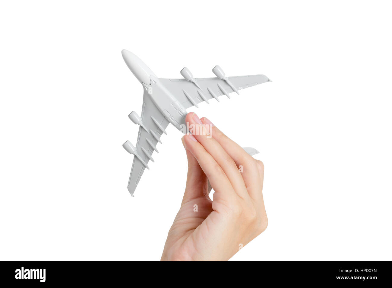 Woman hand holding model aeroplane, isolated on white background Stock ...