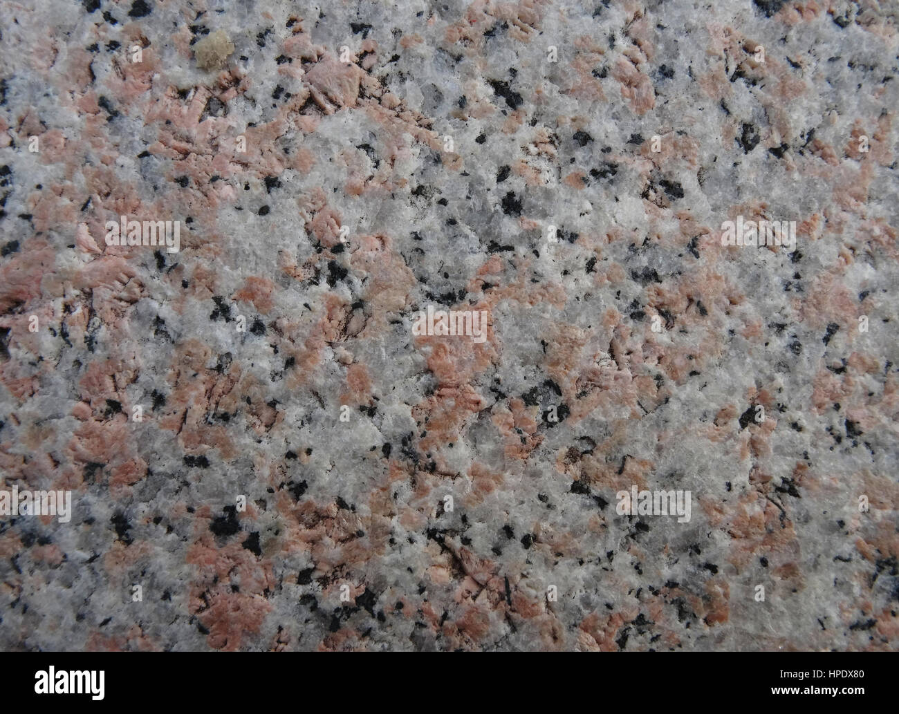 Pink granite rock Stock Photo - Alamy
