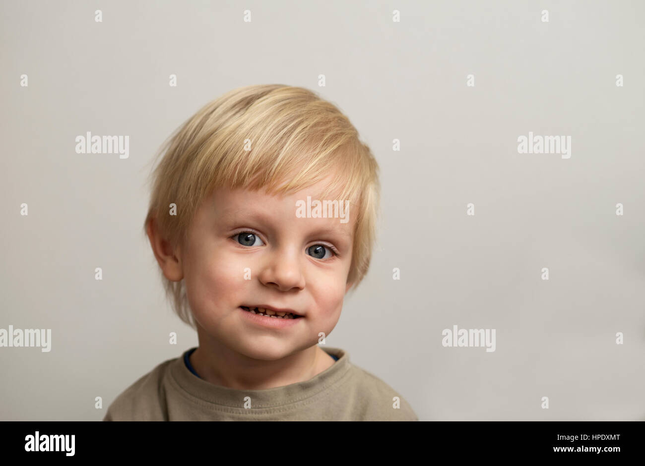 Close up of smiling caucasian boy Stock Photo - Alamy