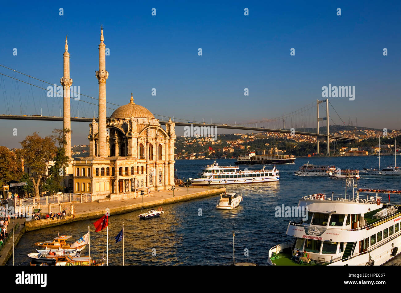 Mecidiye Ortakoy mosque and Bosphorus Strait. In background Bosphorus ...