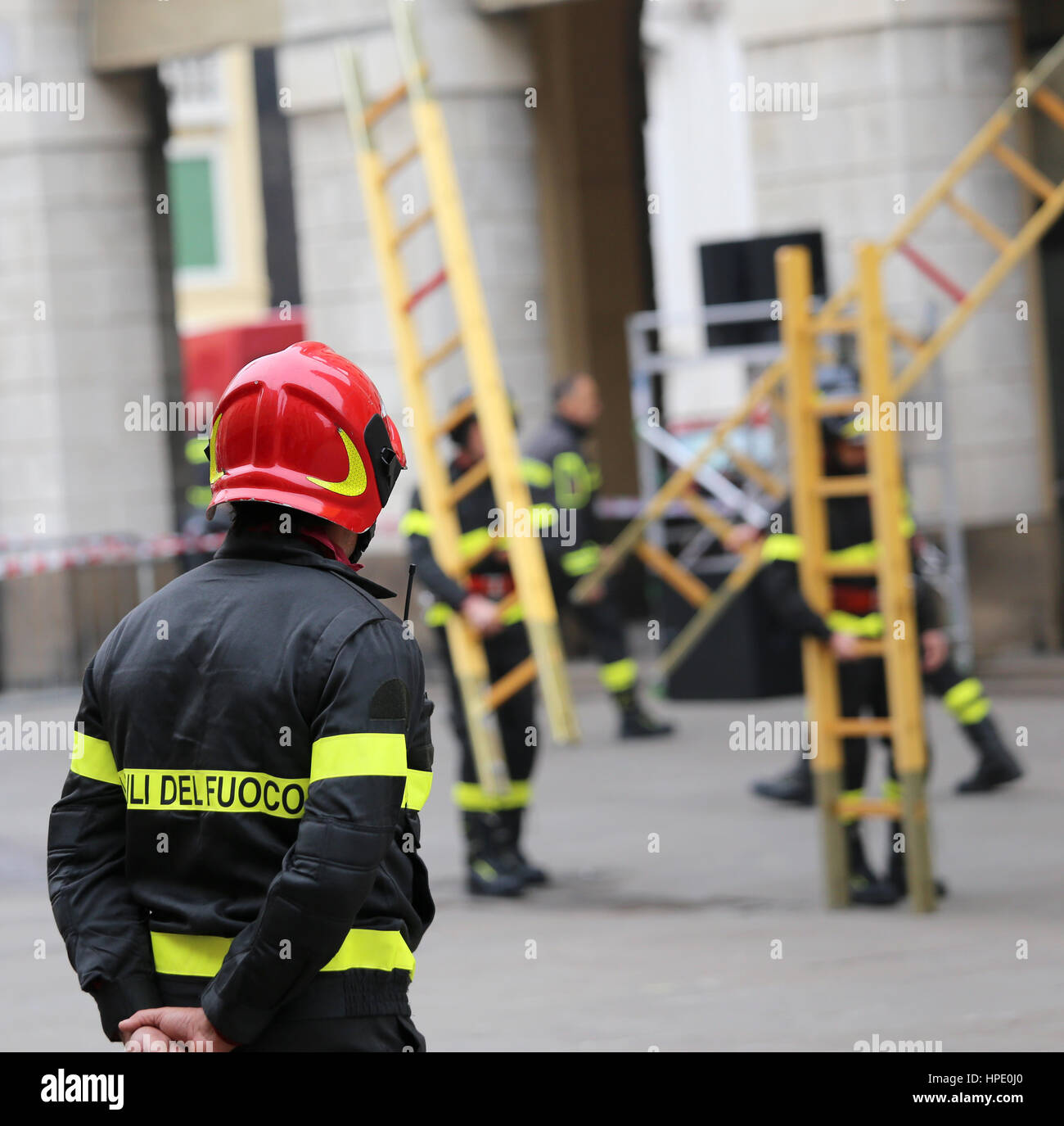 Italian firefighters with protective helmet during outdoor exercise ...
