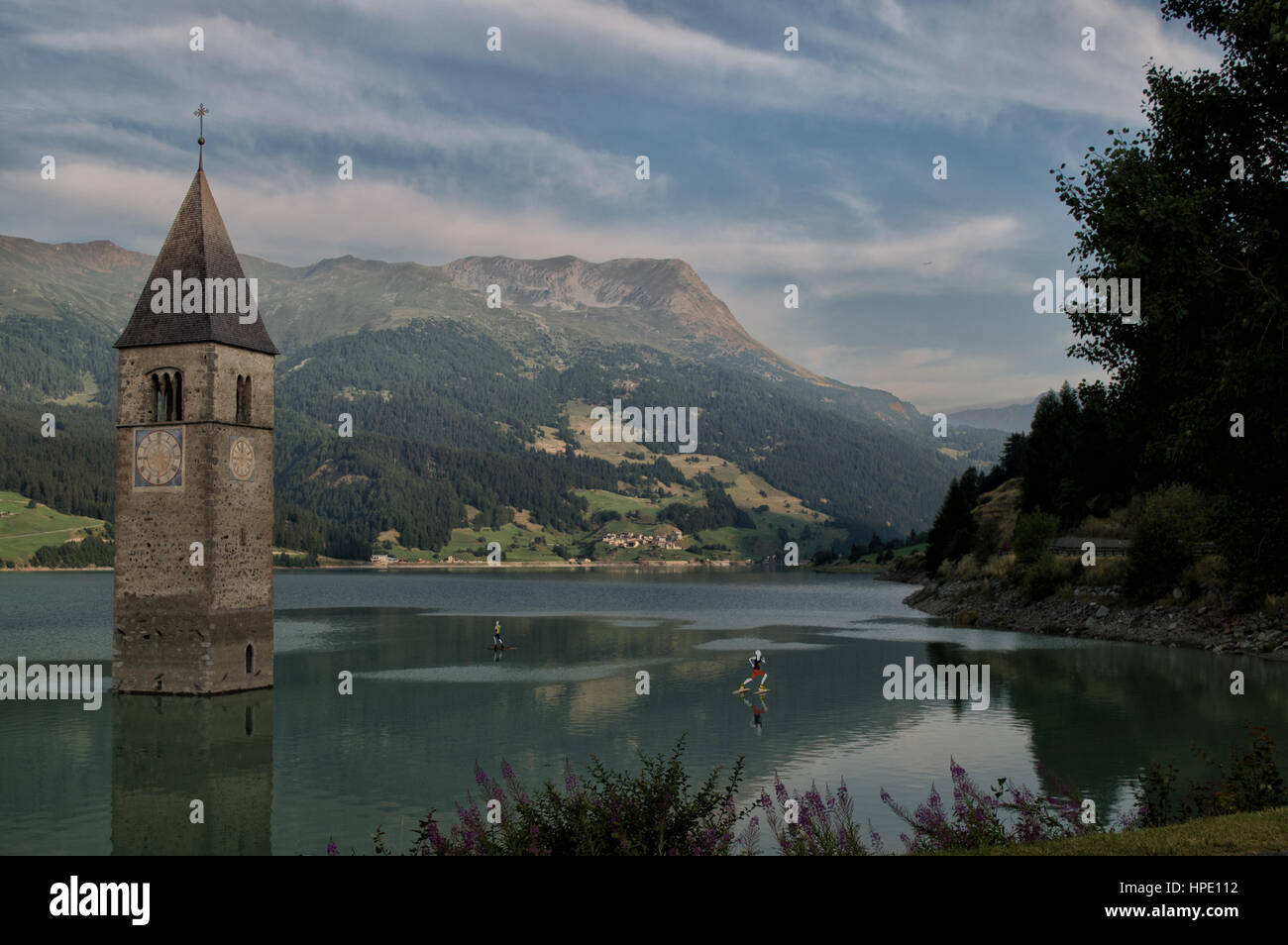 bell tower of the submerged church in the lake of resia in trentino ...