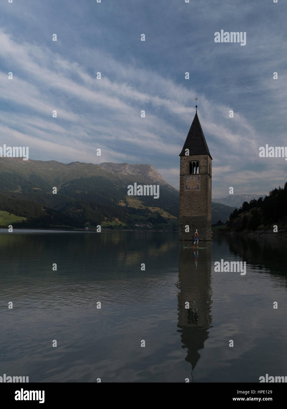 bell tower of the submerged church in the lake of resia in trentino ...