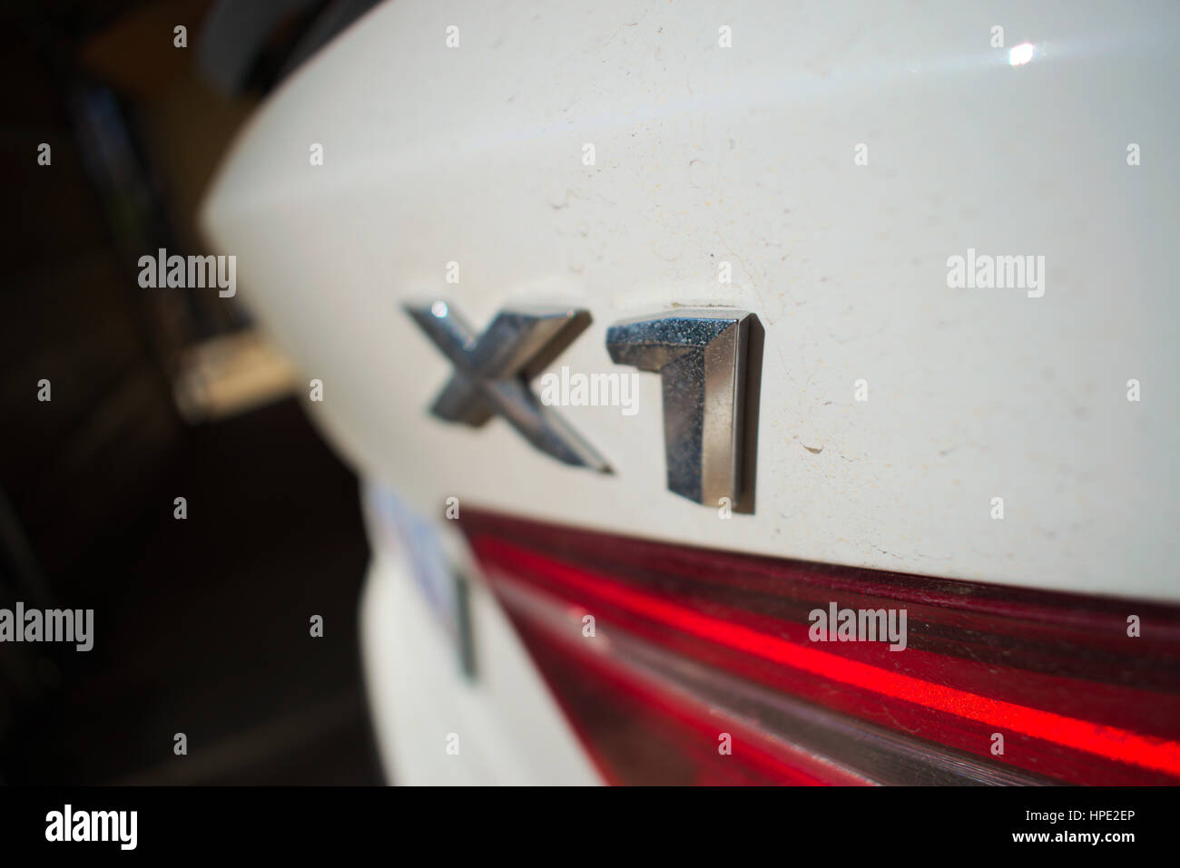 BMW X1 logo on back of car Stock Photo - Alamy