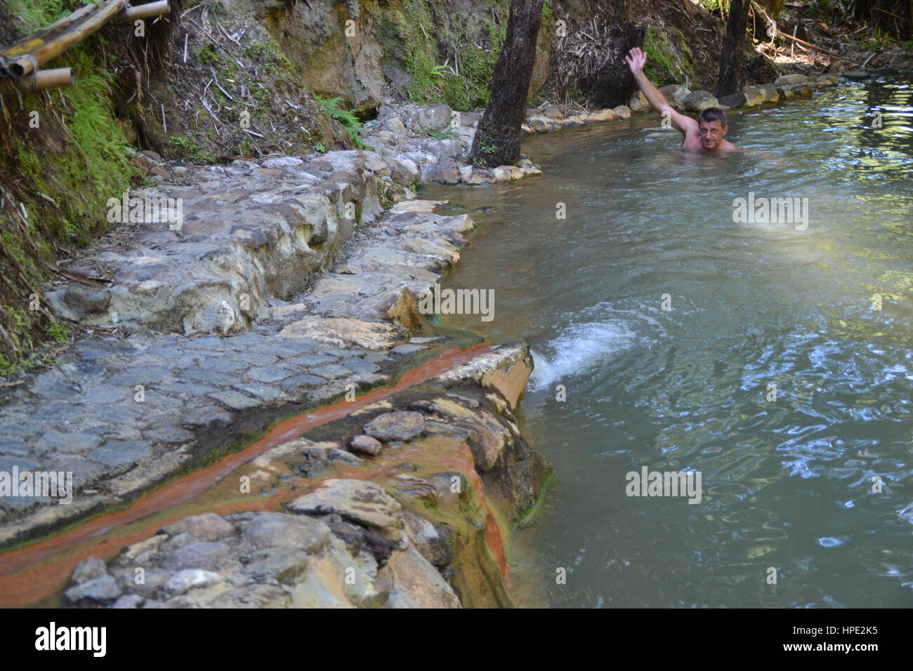 Thermal water and hot springs in Caldeira Velha is located in forest in ...