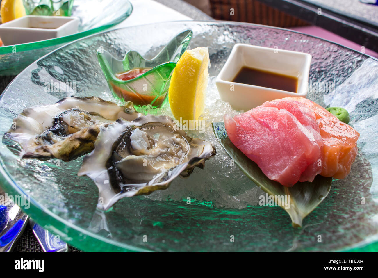 Delicious sashimi on a plate - soft focus Stock Photo - Alamy