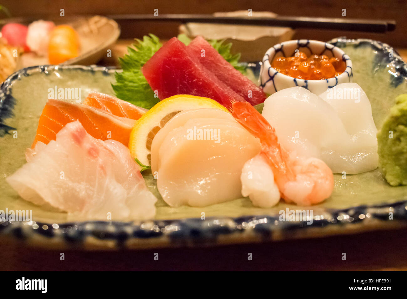 Delicious sashimi on a plate - soft focus, white balance tuned Stock ...