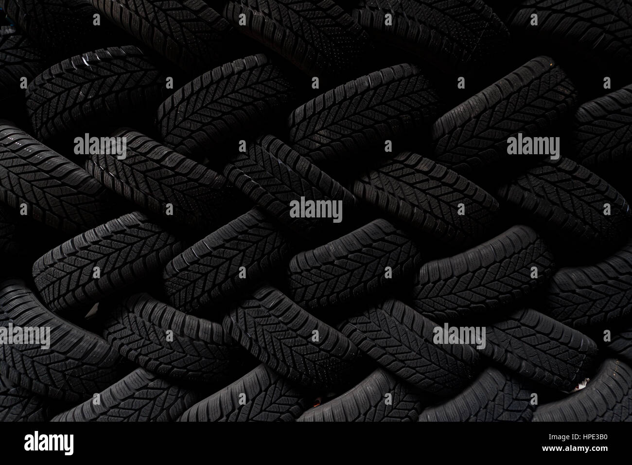 Tire stack in deposit storage Stock Photo - Alamy