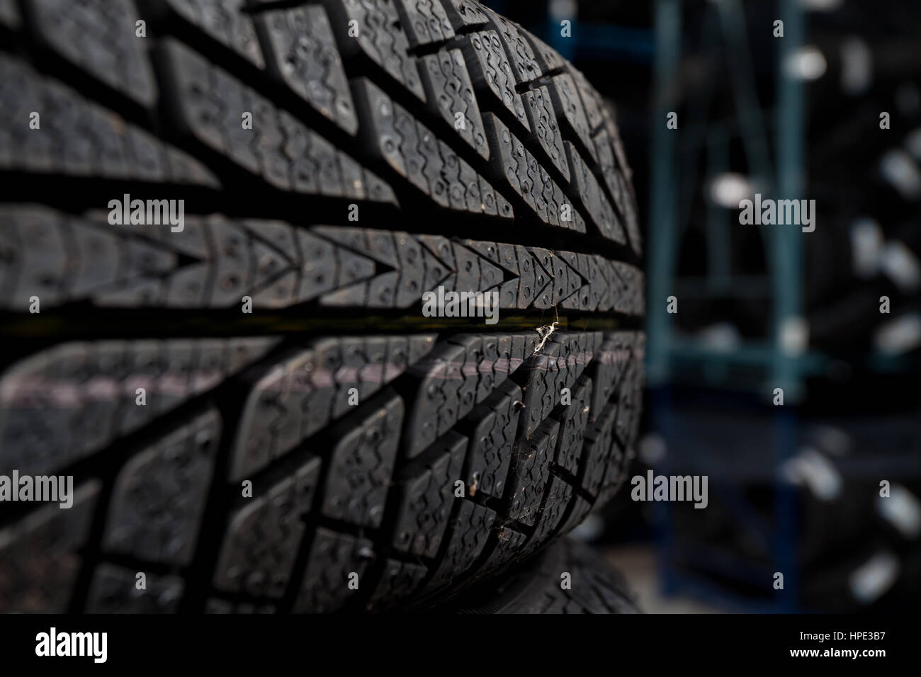 Tire stack in deposit storage Stock Photo - Alamy