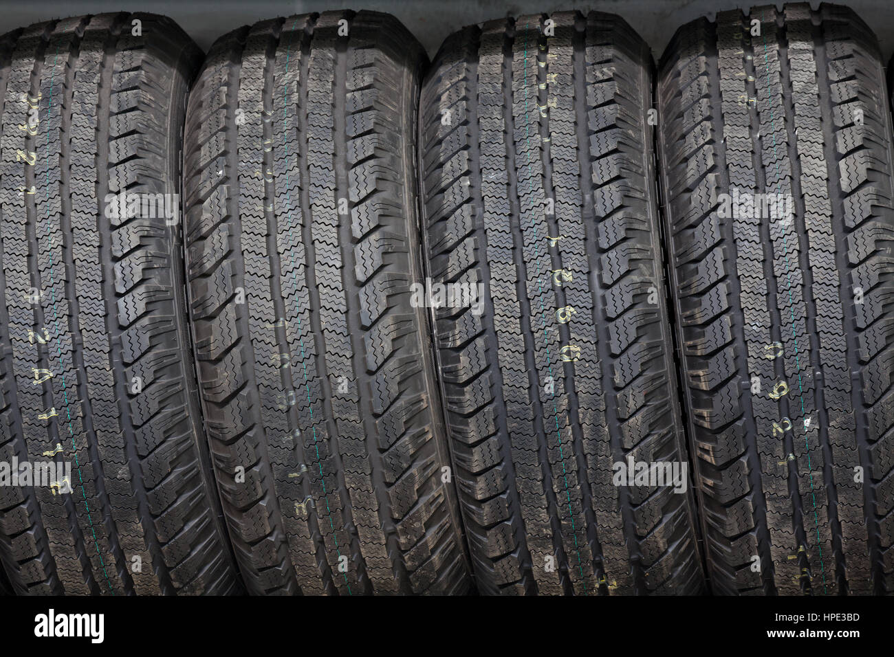 Tire stack in deposit storage Stock Photo - Alamy