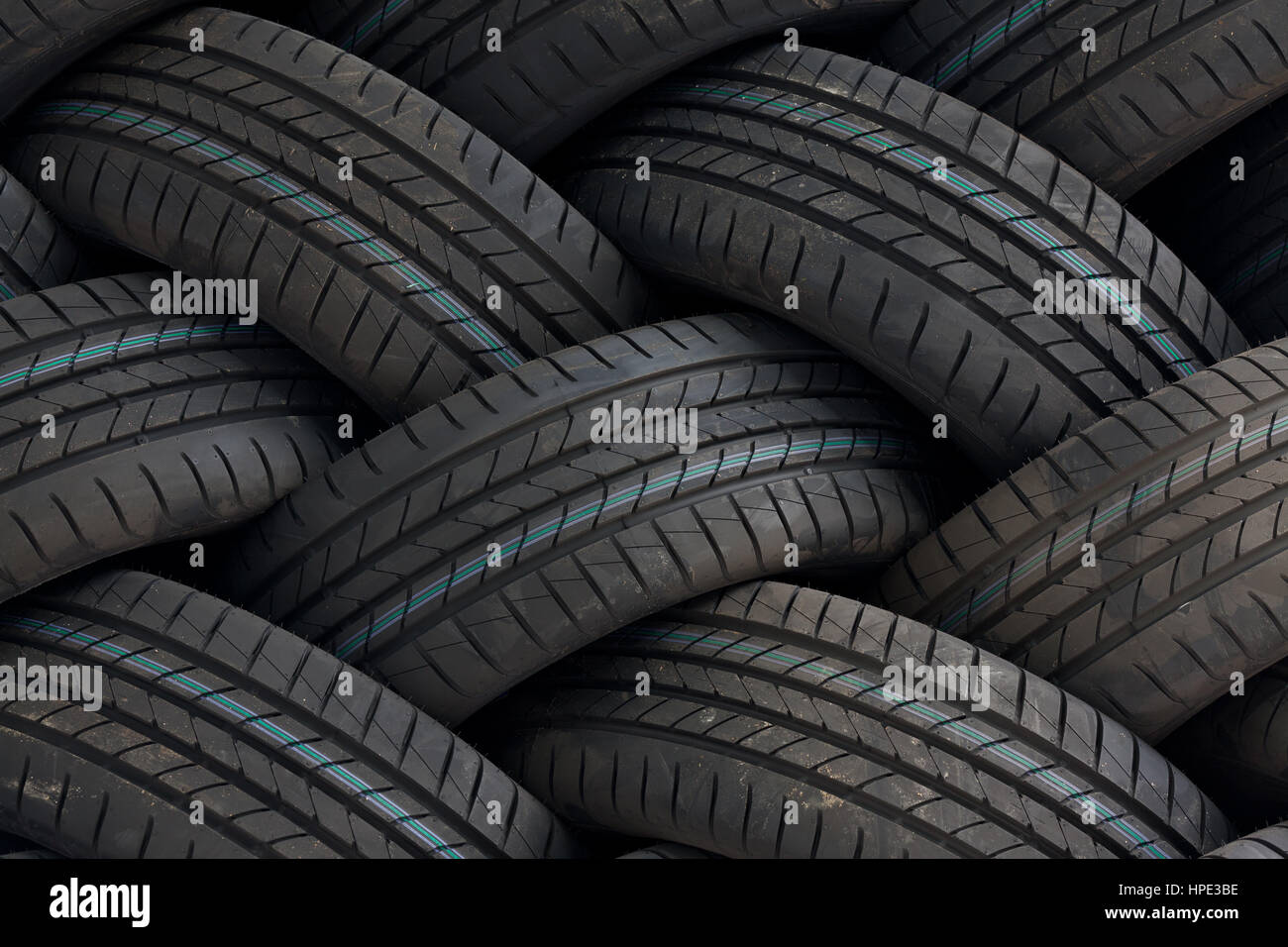 Tire stack in deposit storage Stock Photo - Alamy