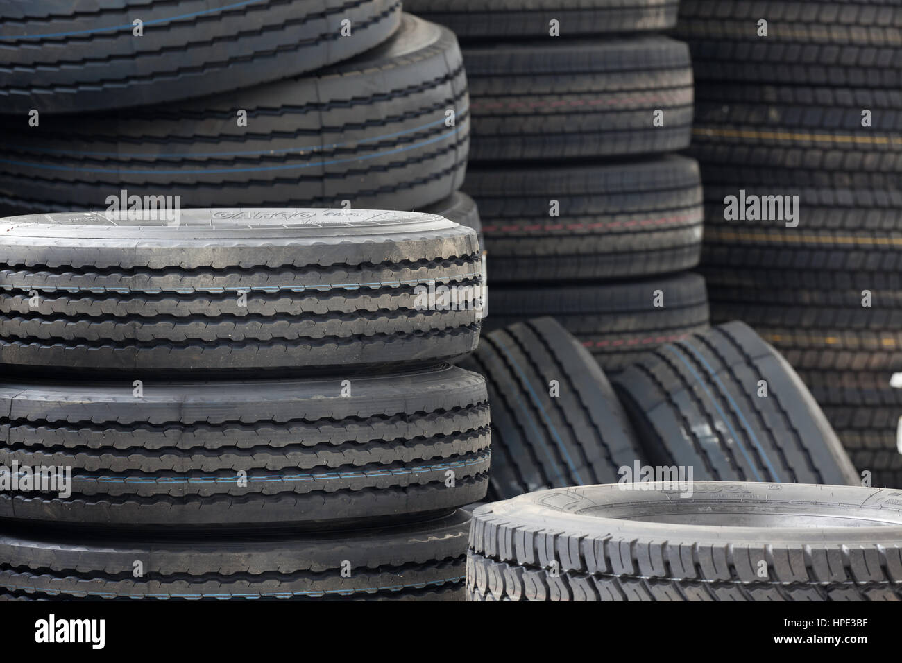 Tire stack in deposit storage Stock Photo - Alamy