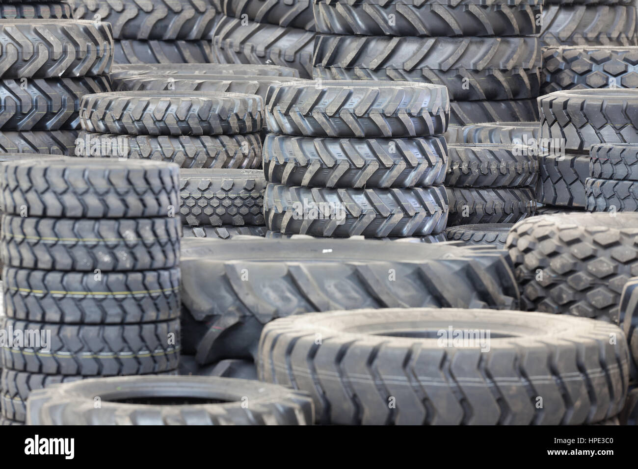 Tire stack in deposit storage Stock Photo - Alamy