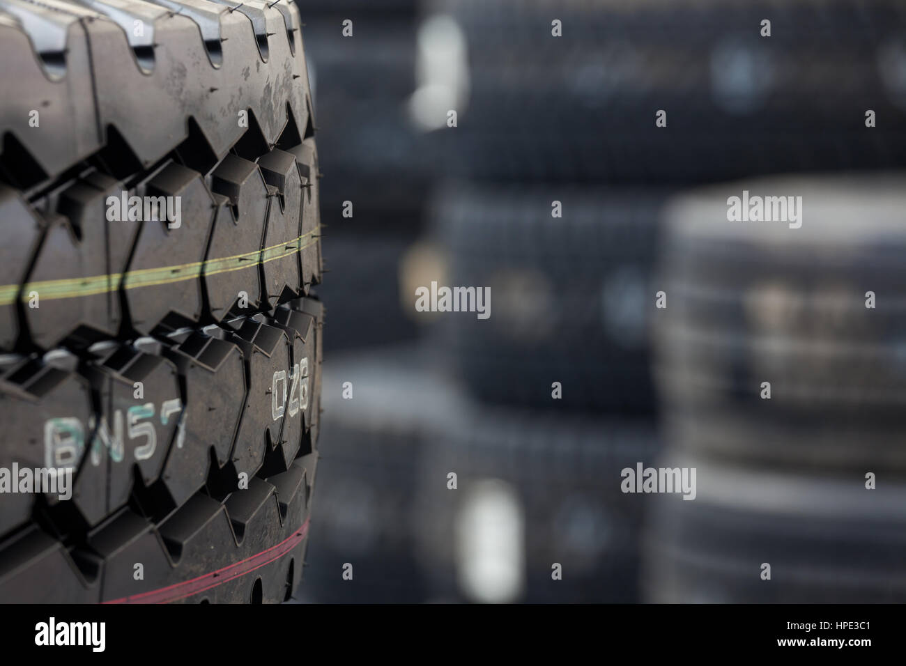 Tire stack in deposit storage Stock Photo - Alamy