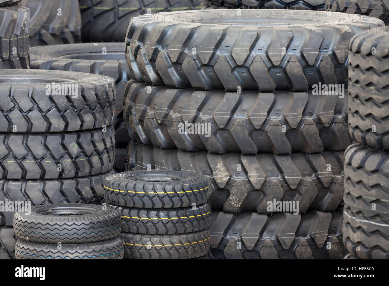 Tire stack in deposit storage Stock Photo - Alamy