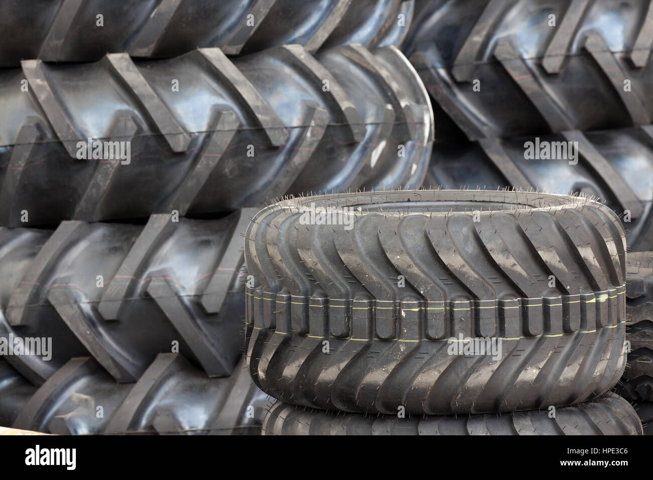 Tire stack in deposit storage Stock Photo - Alamy