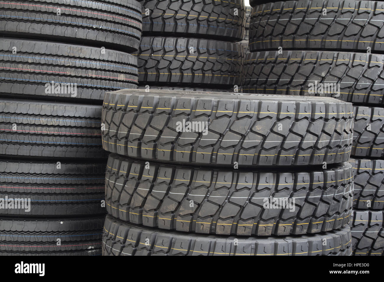 Tire stack in deposit storage Stock Photo - Alamy