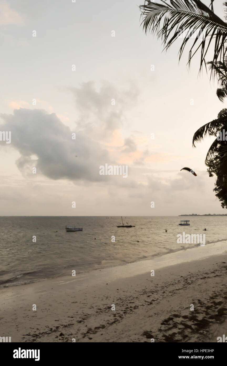 View of the beach and ocean at sunrise in Bamburi, Kenya Stock Photo ...