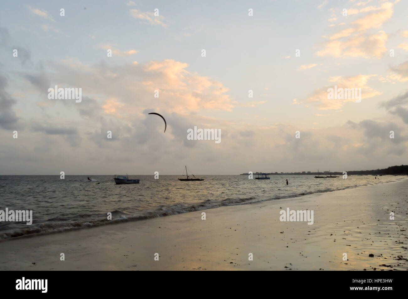 View of the beach and ocean at sunrise in Bamburi, Kenya Stock Photo ...