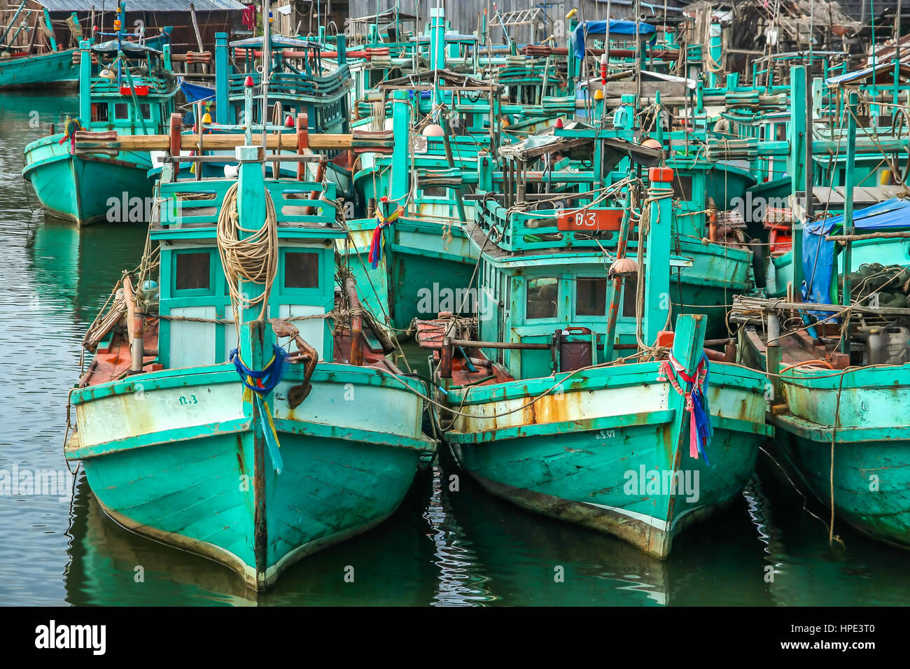 Old fishing boats in a small Cambodian seaside village Stock Photo - Alamy