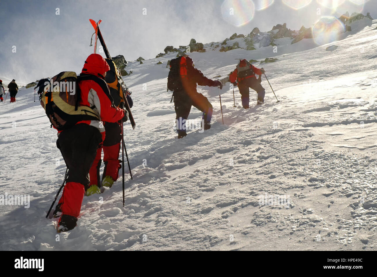 Group of people hiking in beautiful winter mountains Stock Photo - Alamy