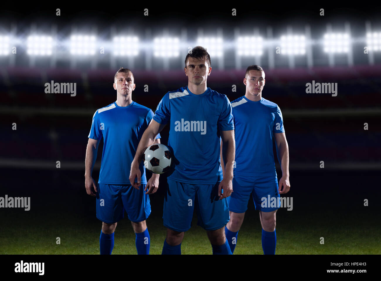 soccer players team group isolated on black background Stock Photo - Alamy