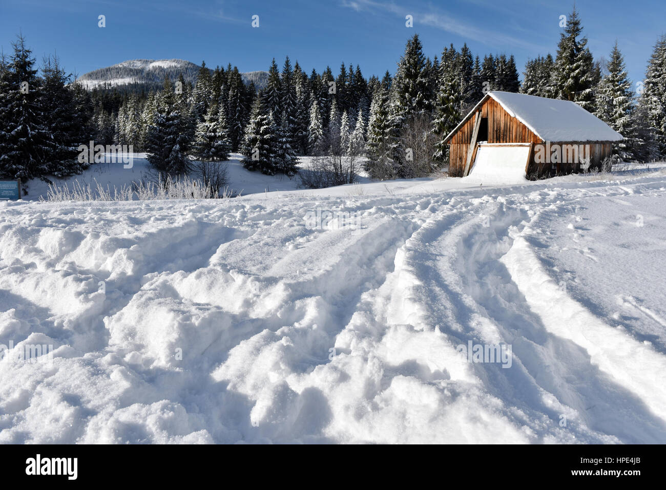 Winter landscape with a small wooden lodge in the mountains Stock Photo ...