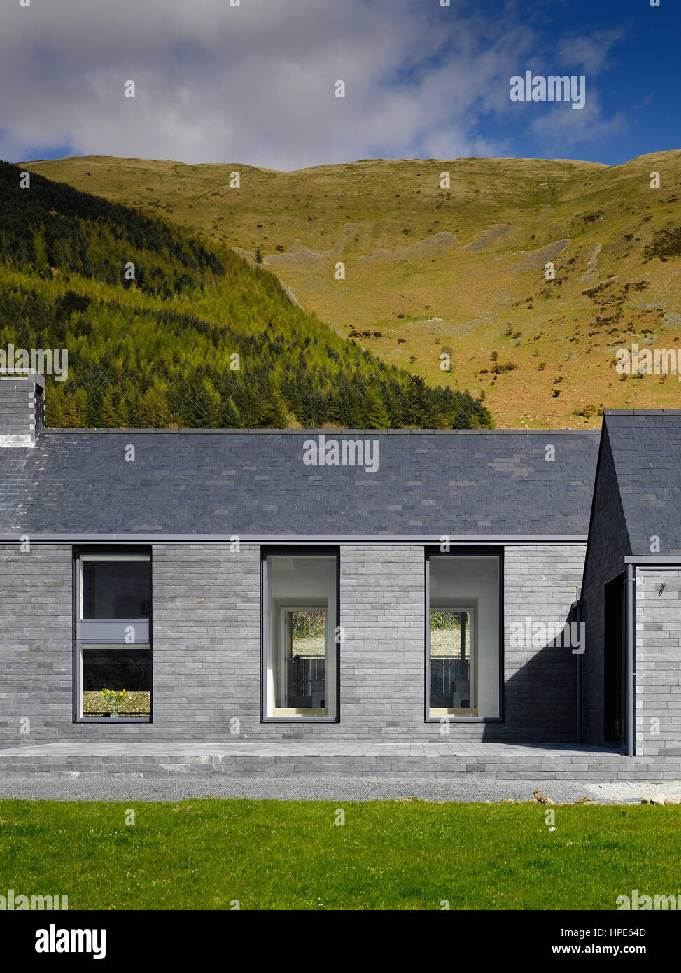 View of South facade with bedroom block and Mourne Mountains in ...