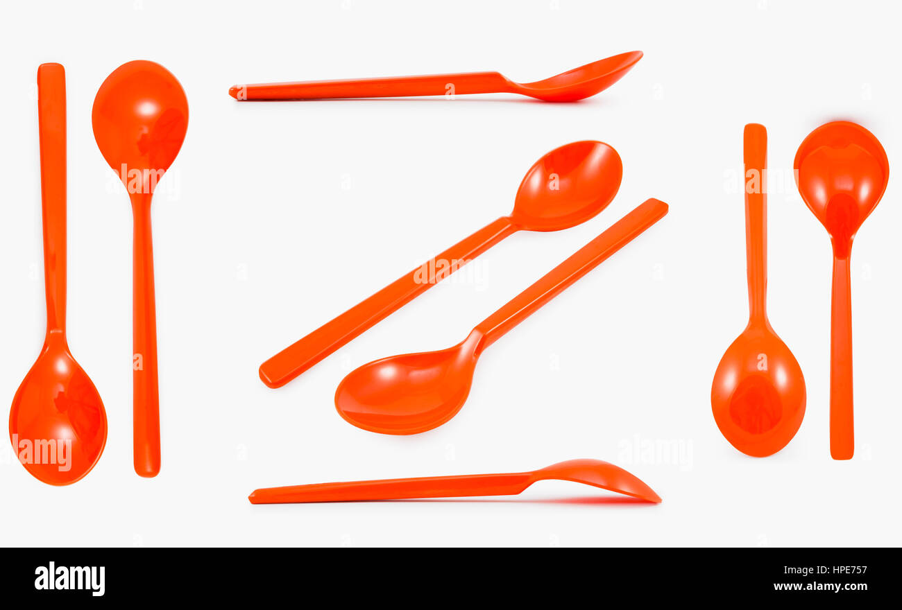 Collection orange plastic spoon isolated on white background Stock ...