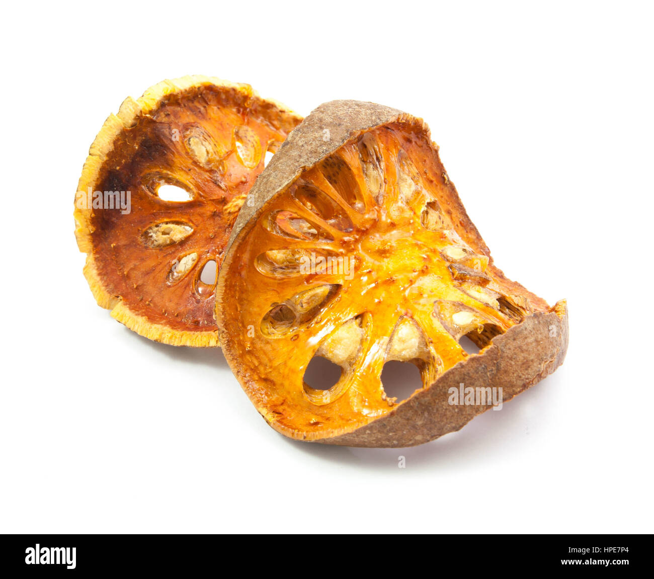 dried quince slices on a white background Stock Photo - Alamy