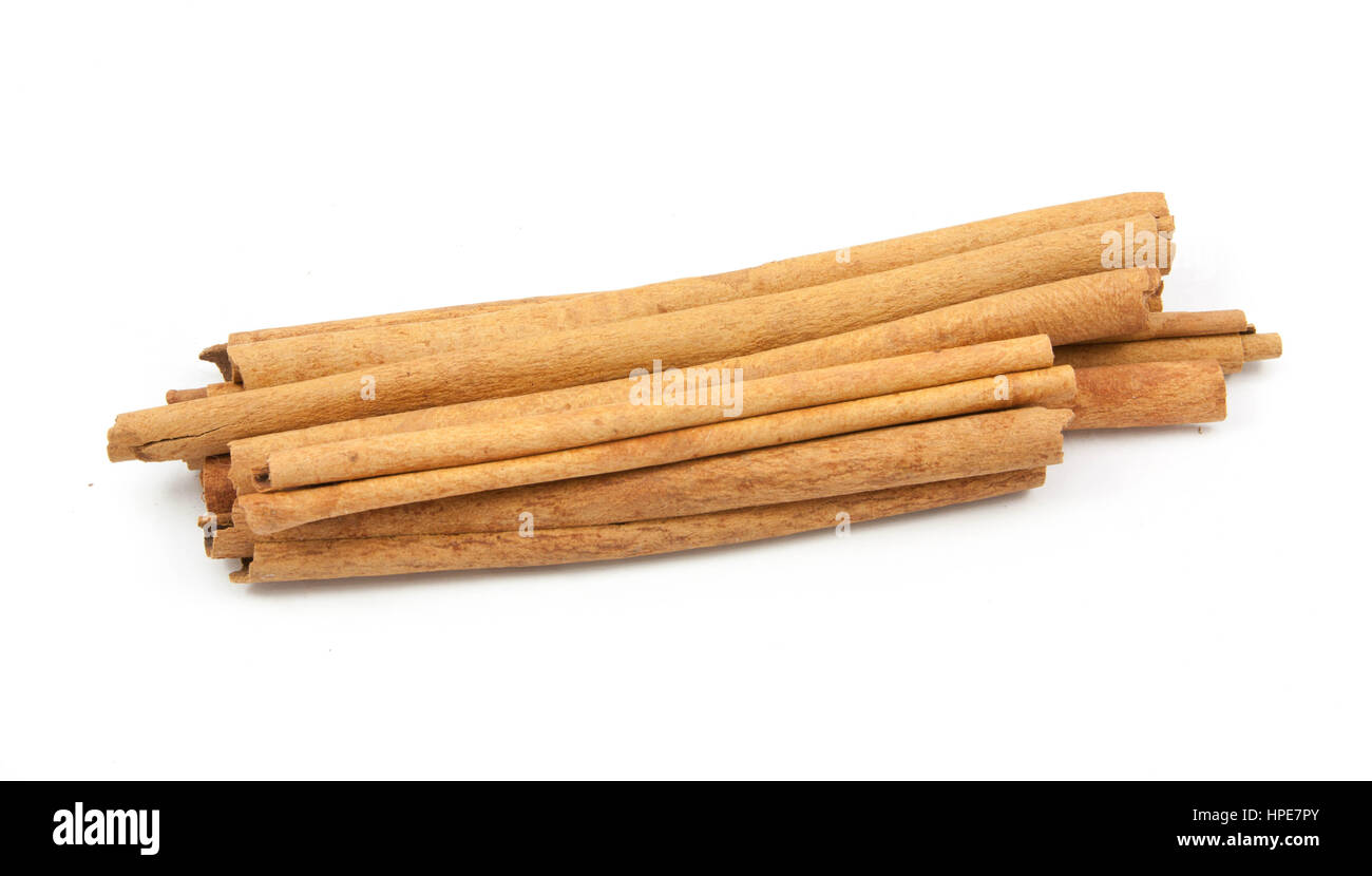 cinnamon ingredients close up isolated on white background Stock Photo ...
