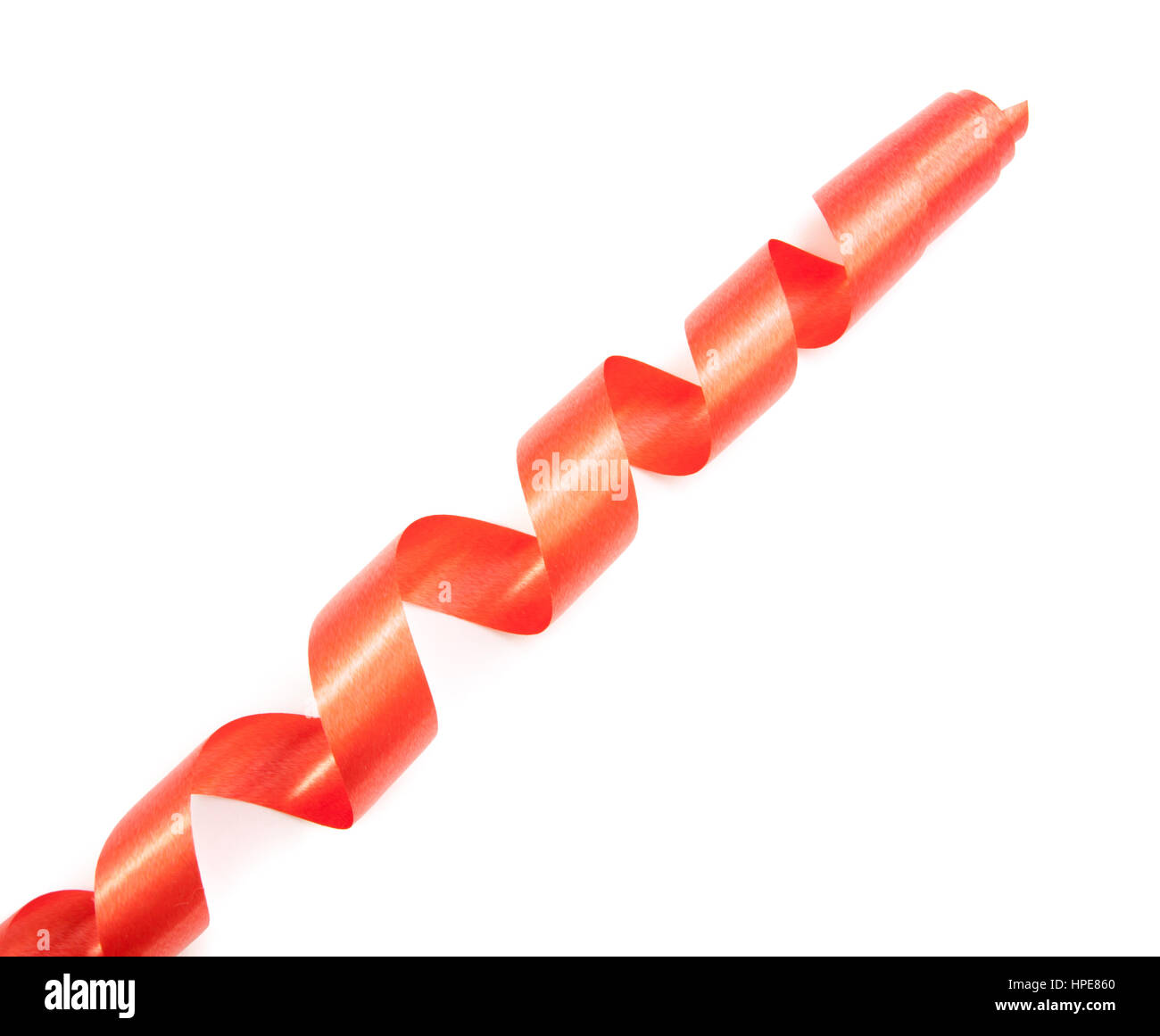 red ribbon serpentine solated on white background Stock Photo - Alamy