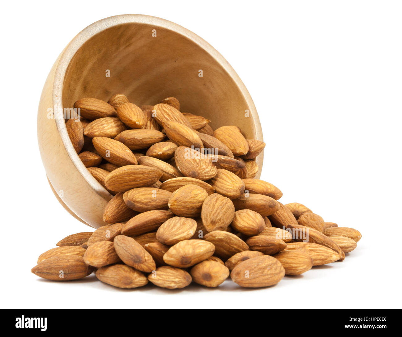 bowl wood of almonds isolated on white background Stock Photo - Alamy
