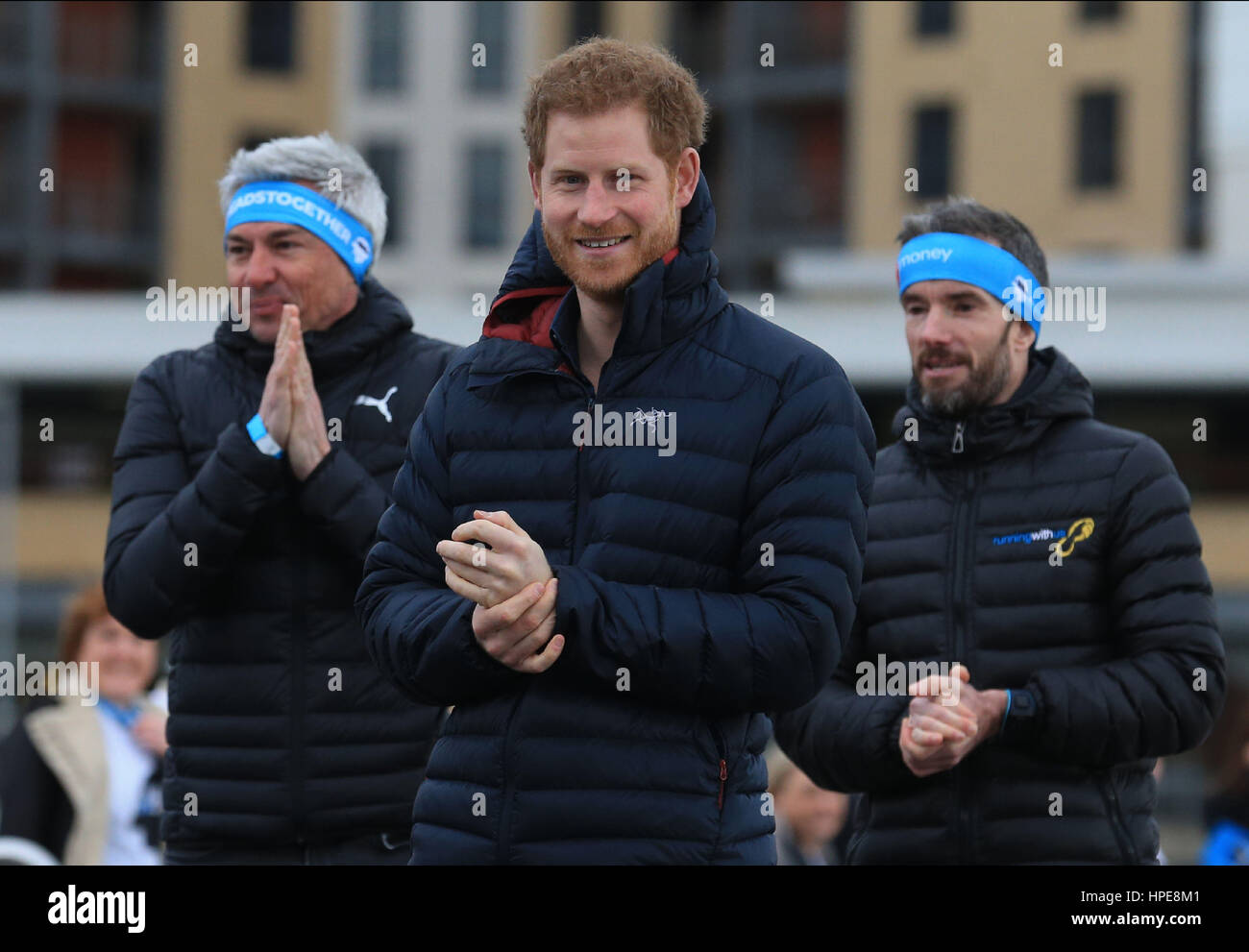 Prince Harry joins Jonathan Edwards (left) and a running coach (right ...
